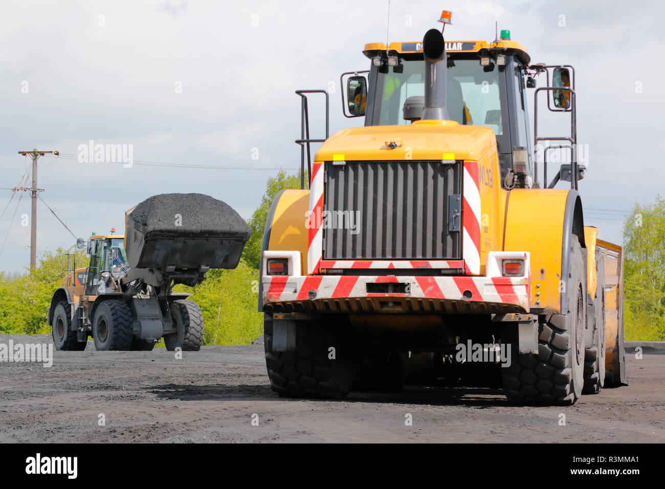 Cat 980h Loader Loading Coal Truck