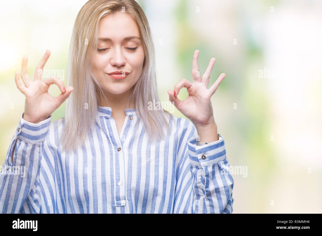 Young blonde woman over isolated background relax and smiling with eyes ...