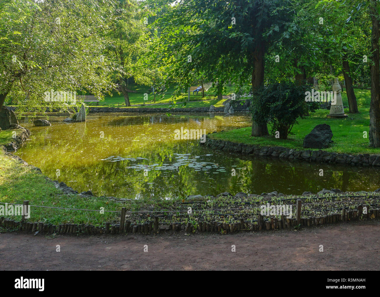 Yerevan Lovers Park with Pond Grass Path and Trees Stock Photo - Alamy