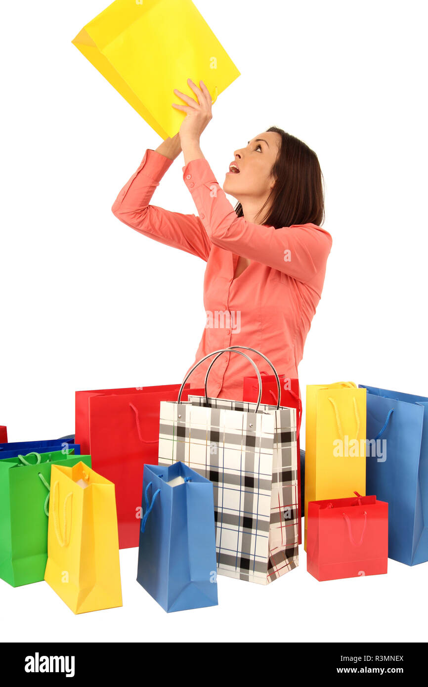 woman looking in her shopping bag Stock Photo - Alamy