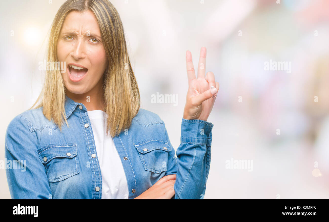 Hispanic beautiful woman winking face hi-res stock photography and ...