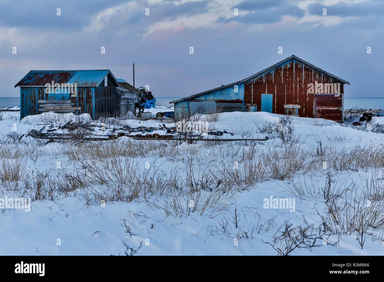 Old fishing building in winter snow Shiretoko Peninsula, Hokkaido ...