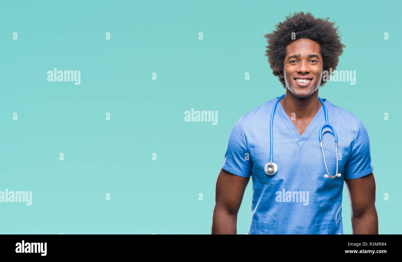 Afro american surgeon doctor man over isolated background with a happy ...
