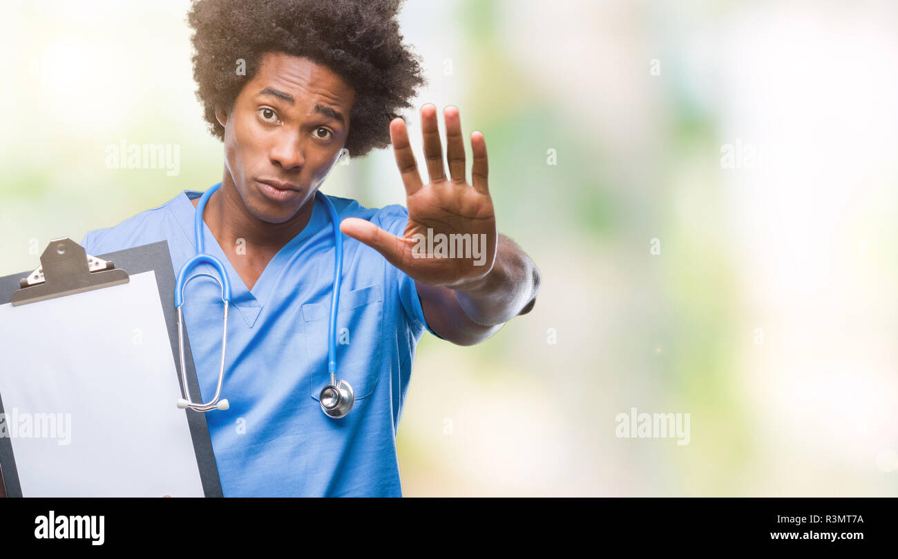 Afro american surgeon doctor holding clipboard man over isolated ...