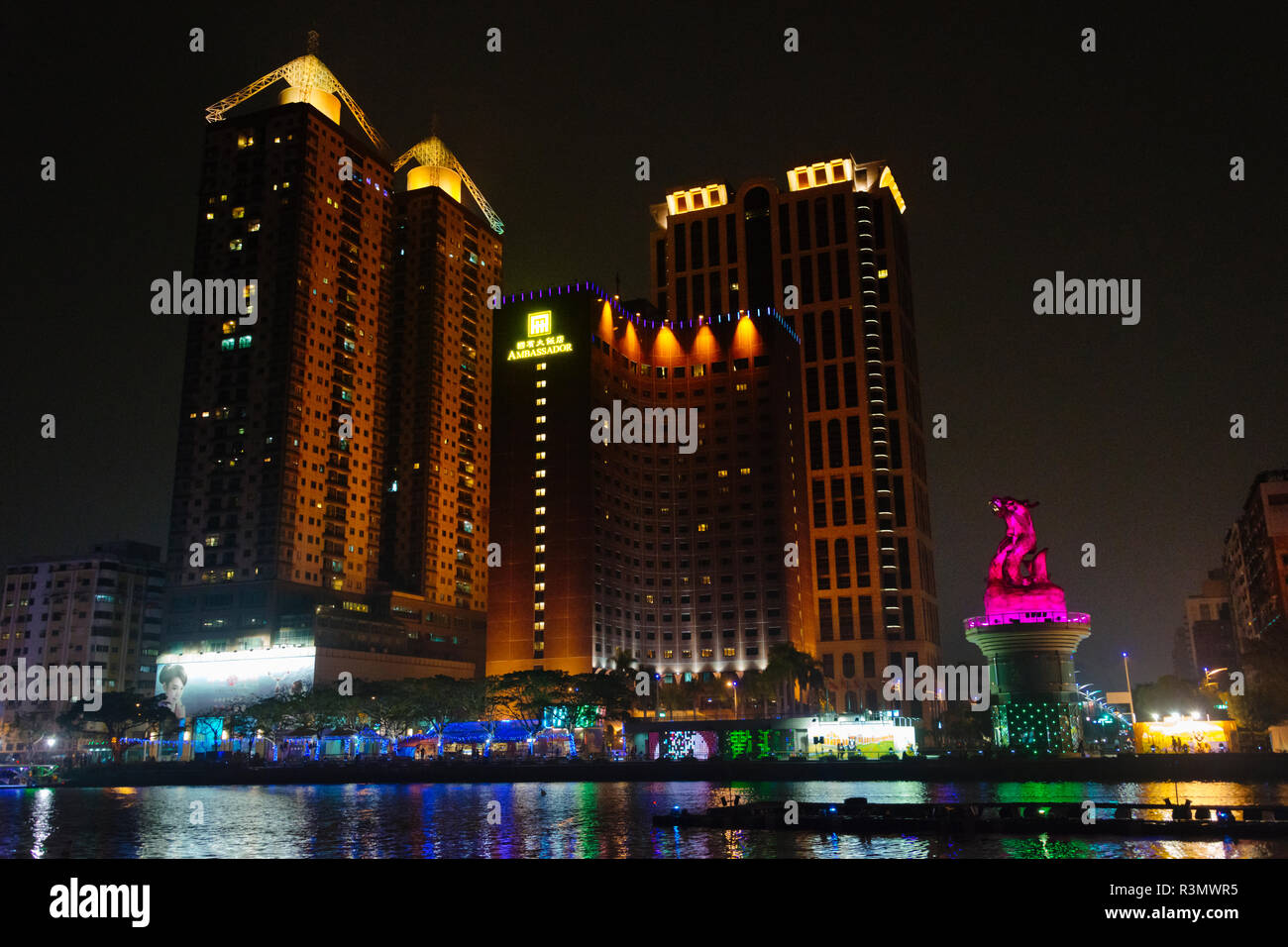 Night view of High-rises by Love River in downtown Kaohsiung, Taiwan ...