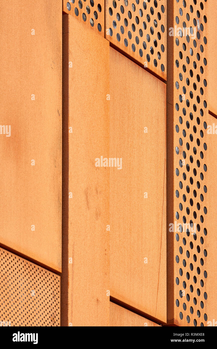 Perforated Cor-ten facade detail. Olga Primary School, London, United ...