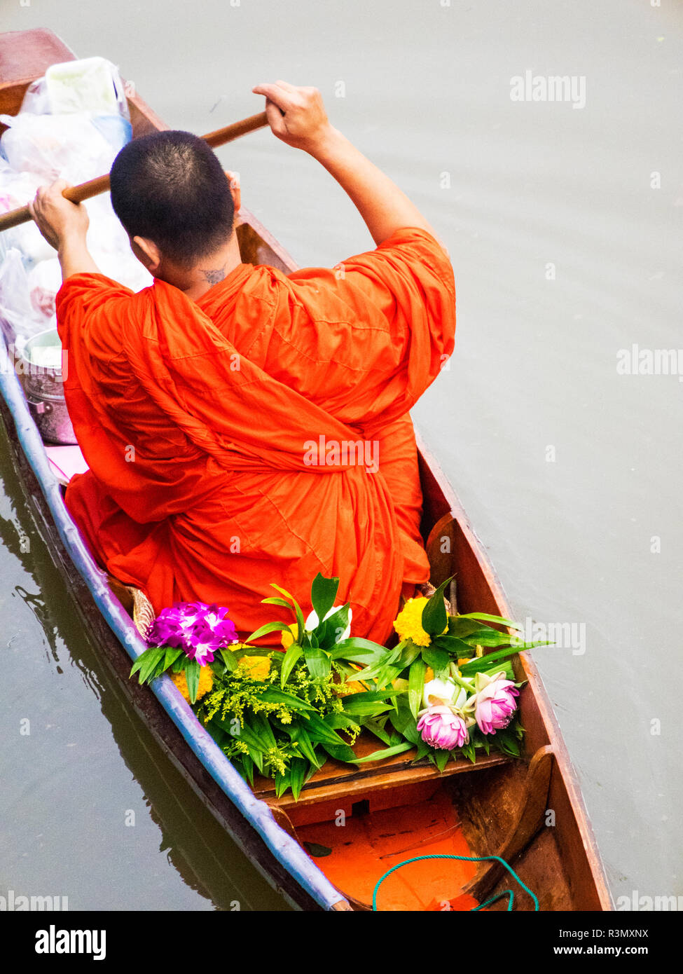 Thailand, Bangkok, Monk getting Alms at Floating Market in Damnoen ...