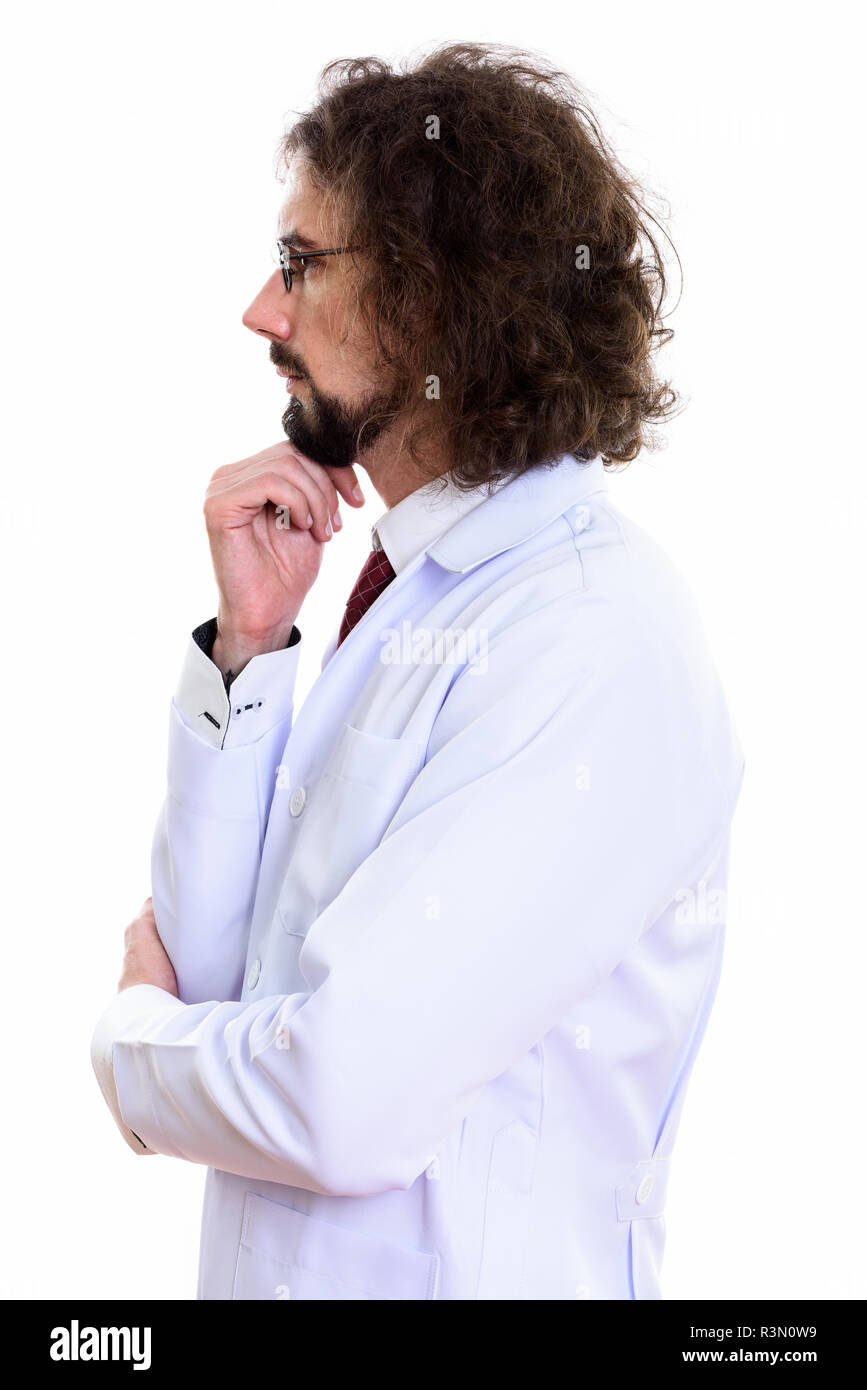 Profile view of handsome man doctor thinking Stock Photo - Alamy