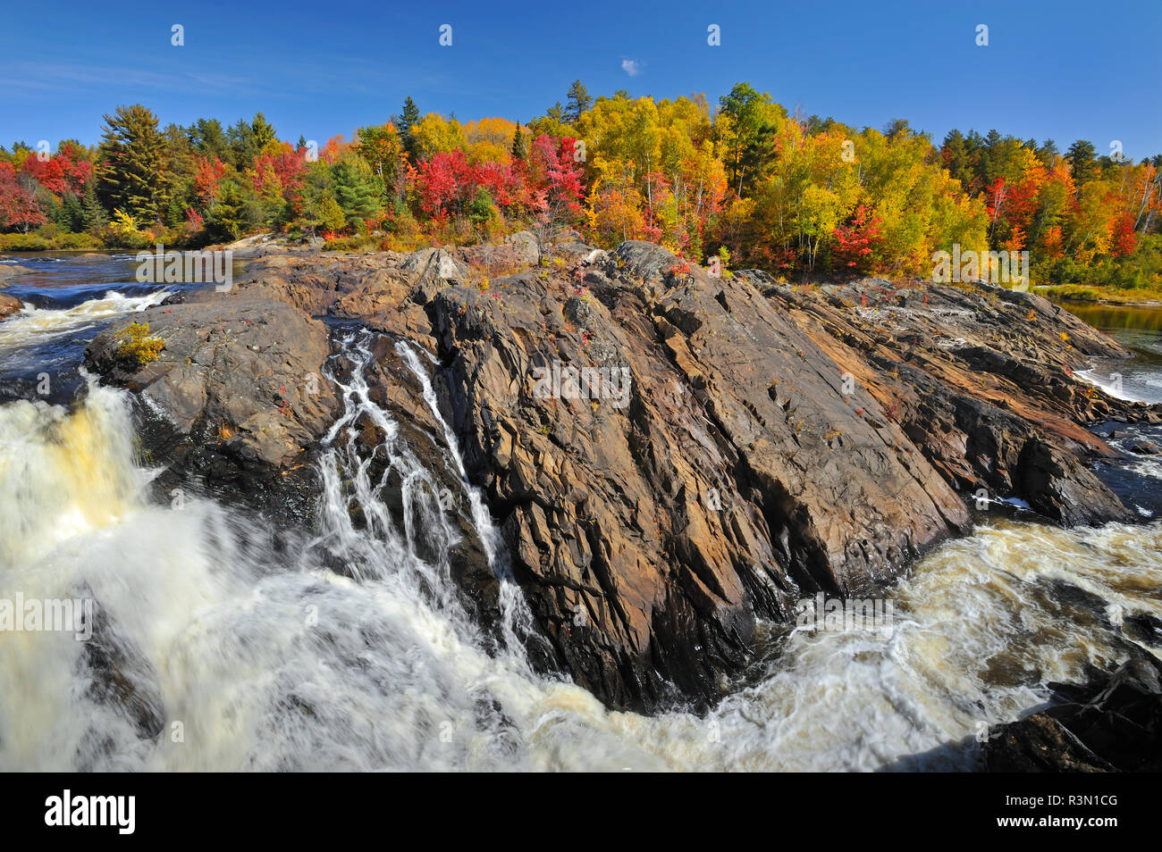 Canada, Ontario, Chutes Provincial Park. Aux Sables River and autumn ...