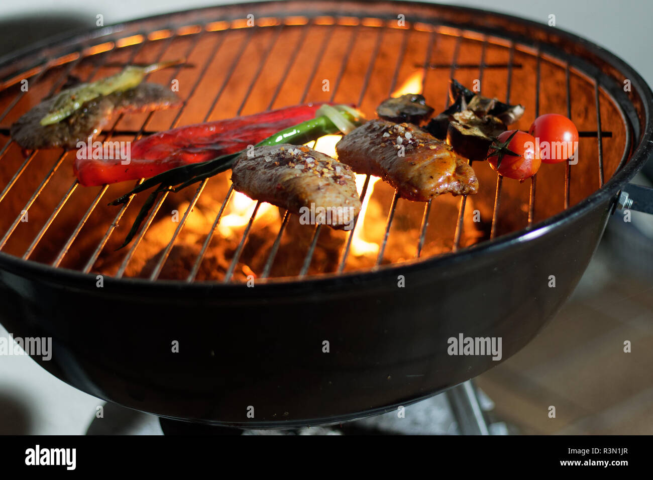 juicy wild hog with vegetables on a charcoal grill barbecue Stock Photo ...