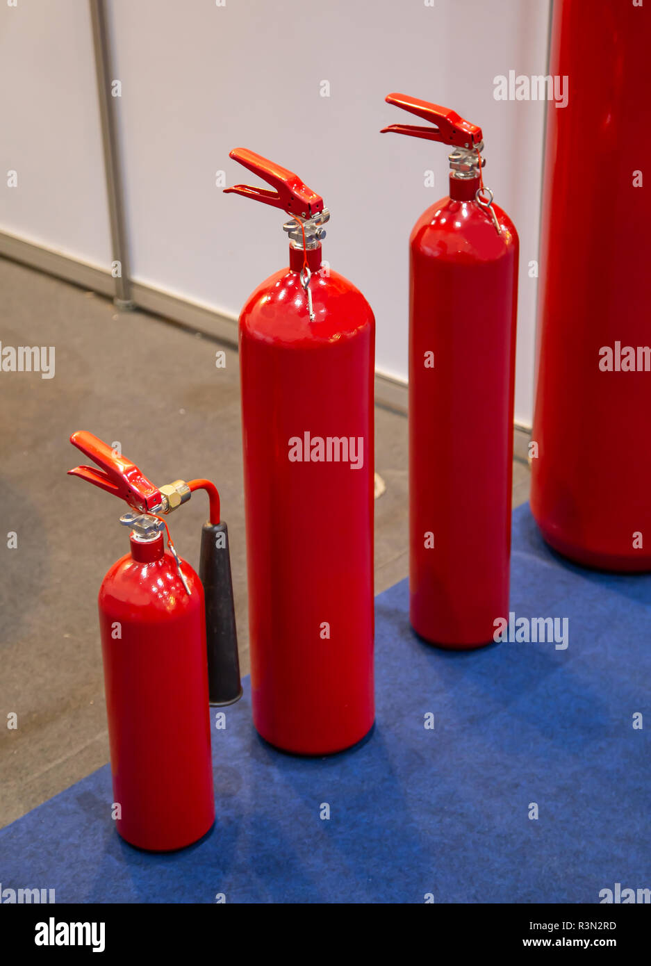 Different size of fire extinguishers, Fire fighting device Stock Photo ...
