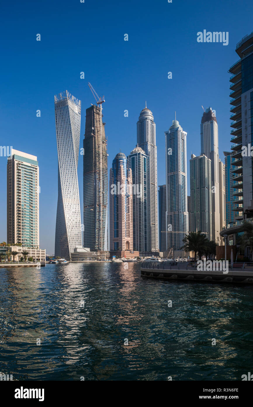 UAE, Dubai Marina high-rise buildings including the twisted Cayan Tower ...