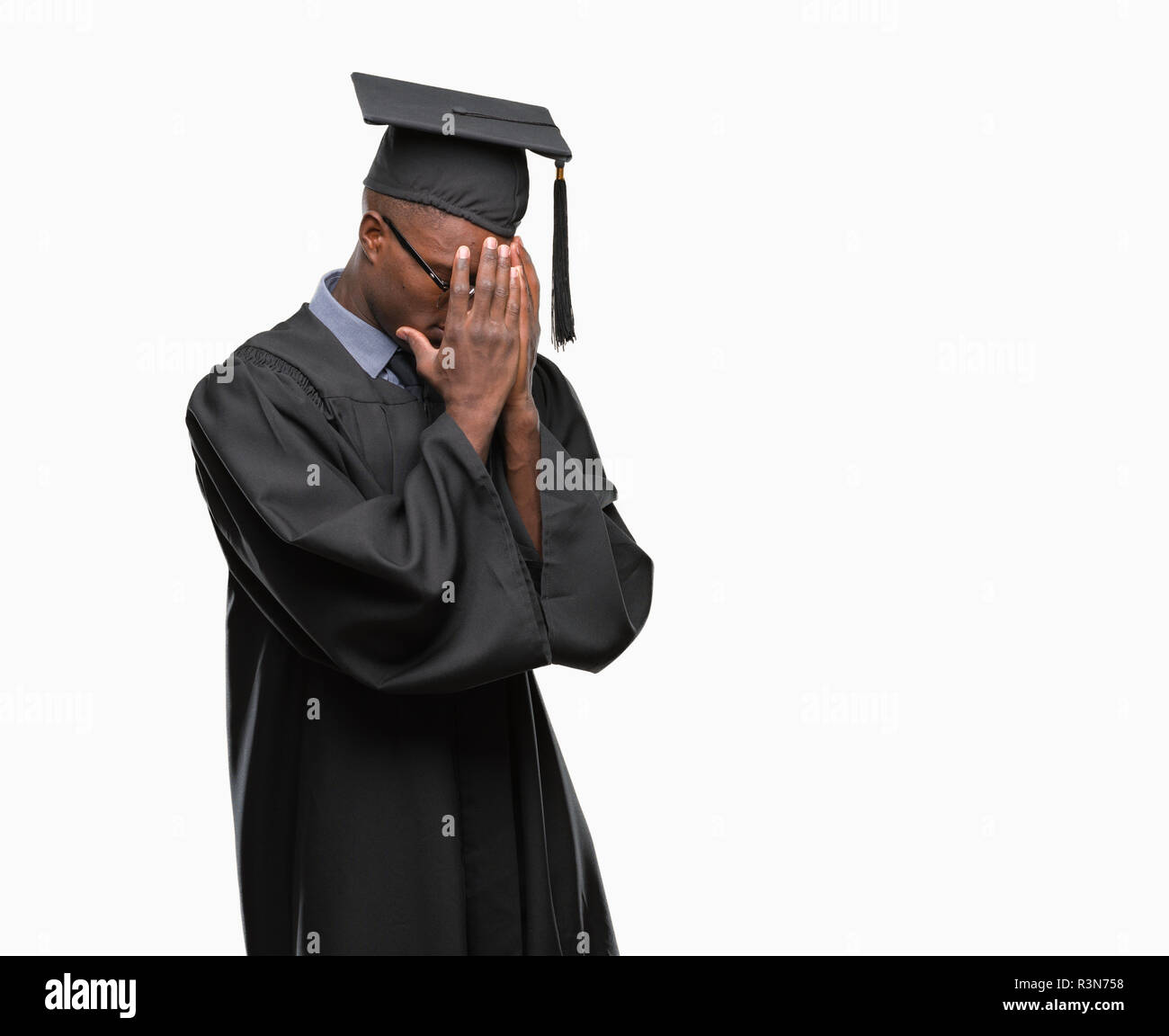Young graduated african american man over isolated background with sad ...