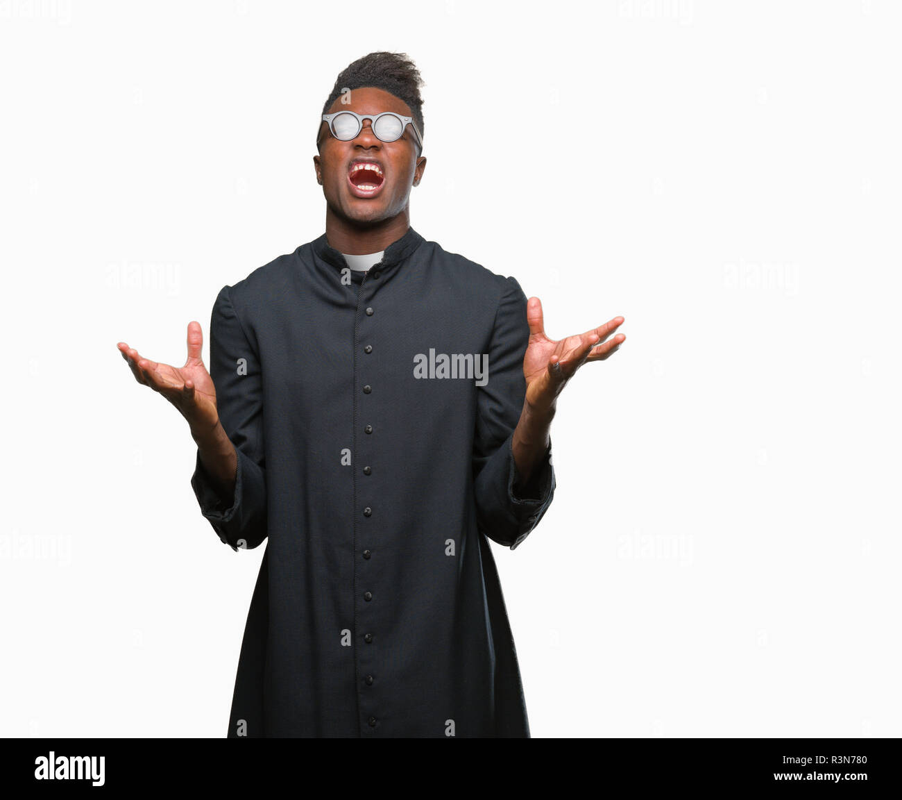 Young african american priest man over isolated background crazy and ...