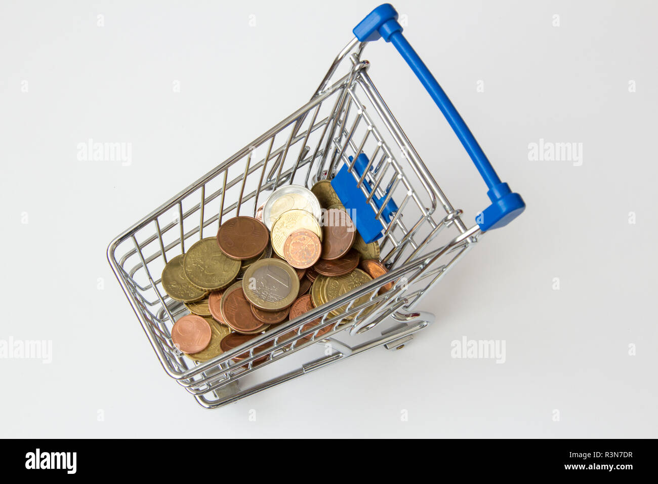 shopping cart with money Stock Photo - Alamy