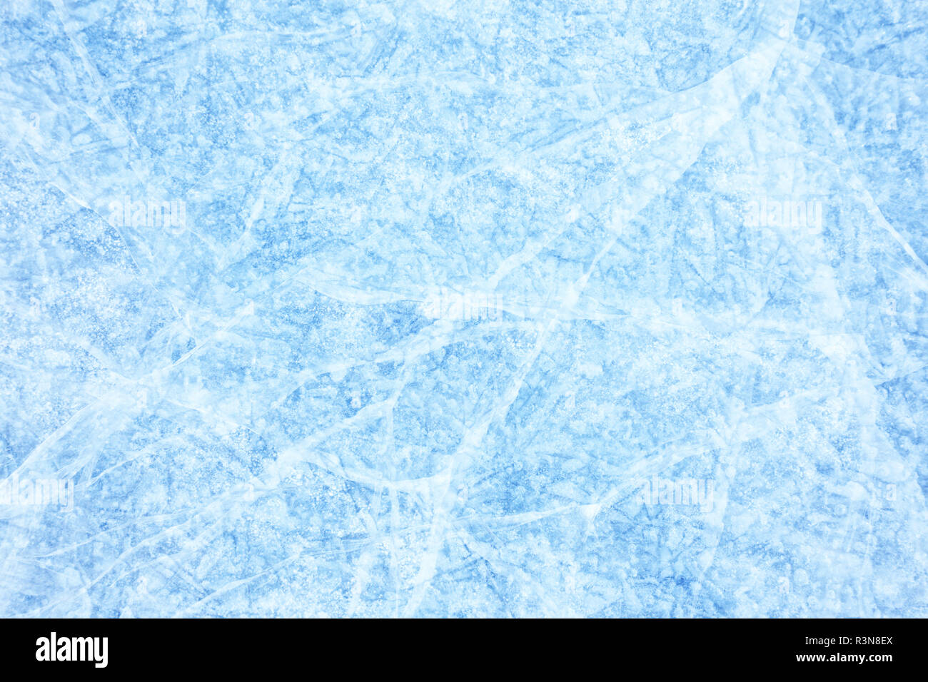 Surface of winter ice on Baikal lake in Siberia . Blue background of ...