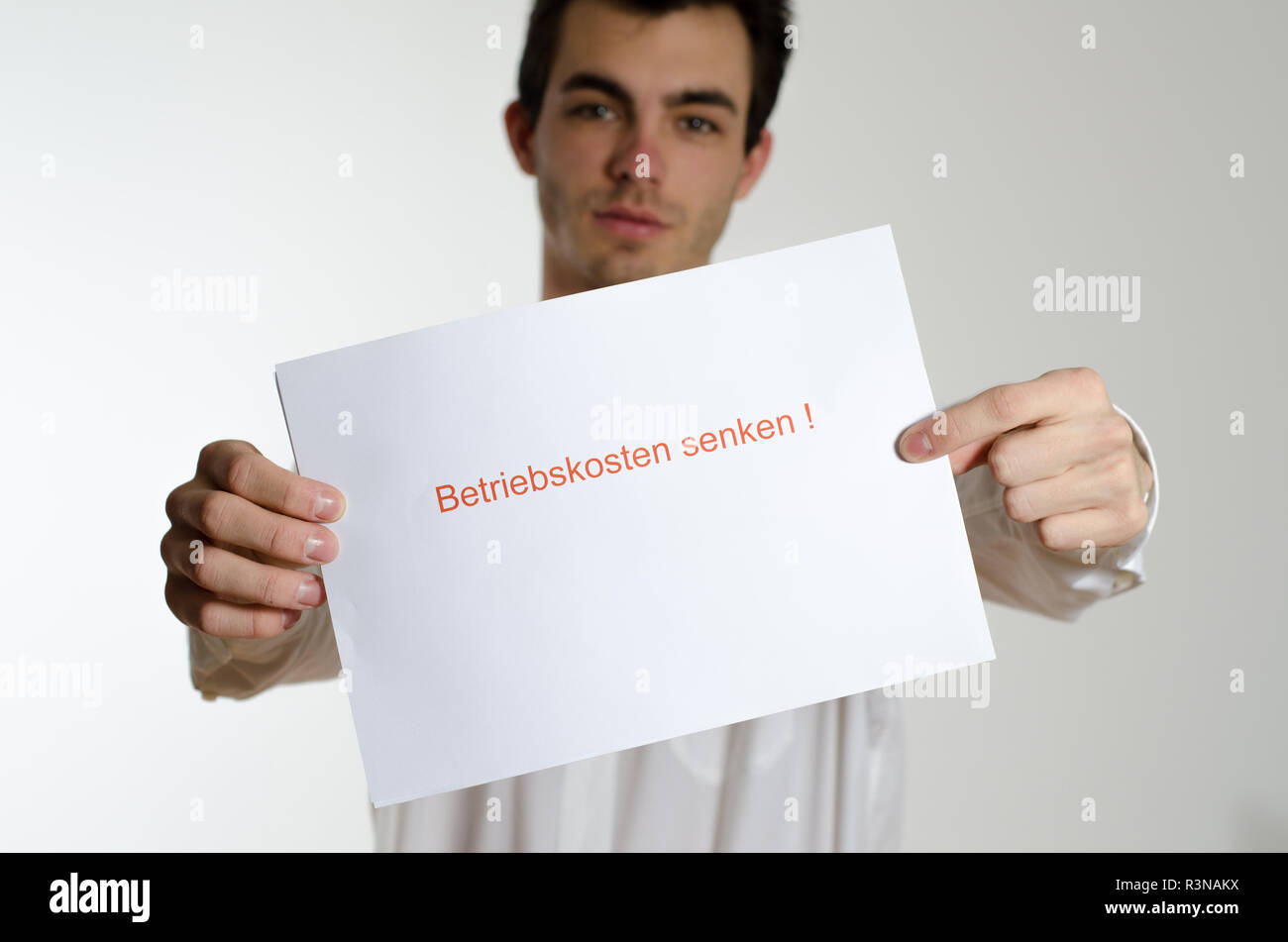 Lowering costs hi-res stock photography and images - Alamy