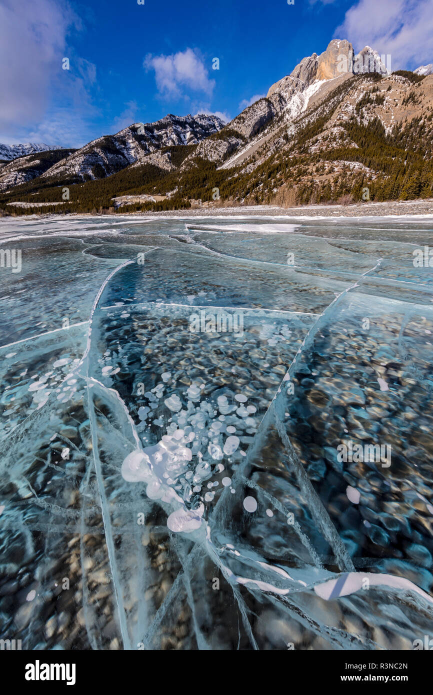 Mount Abraham at sunrise with methane ice bubbles under clear ice on ...