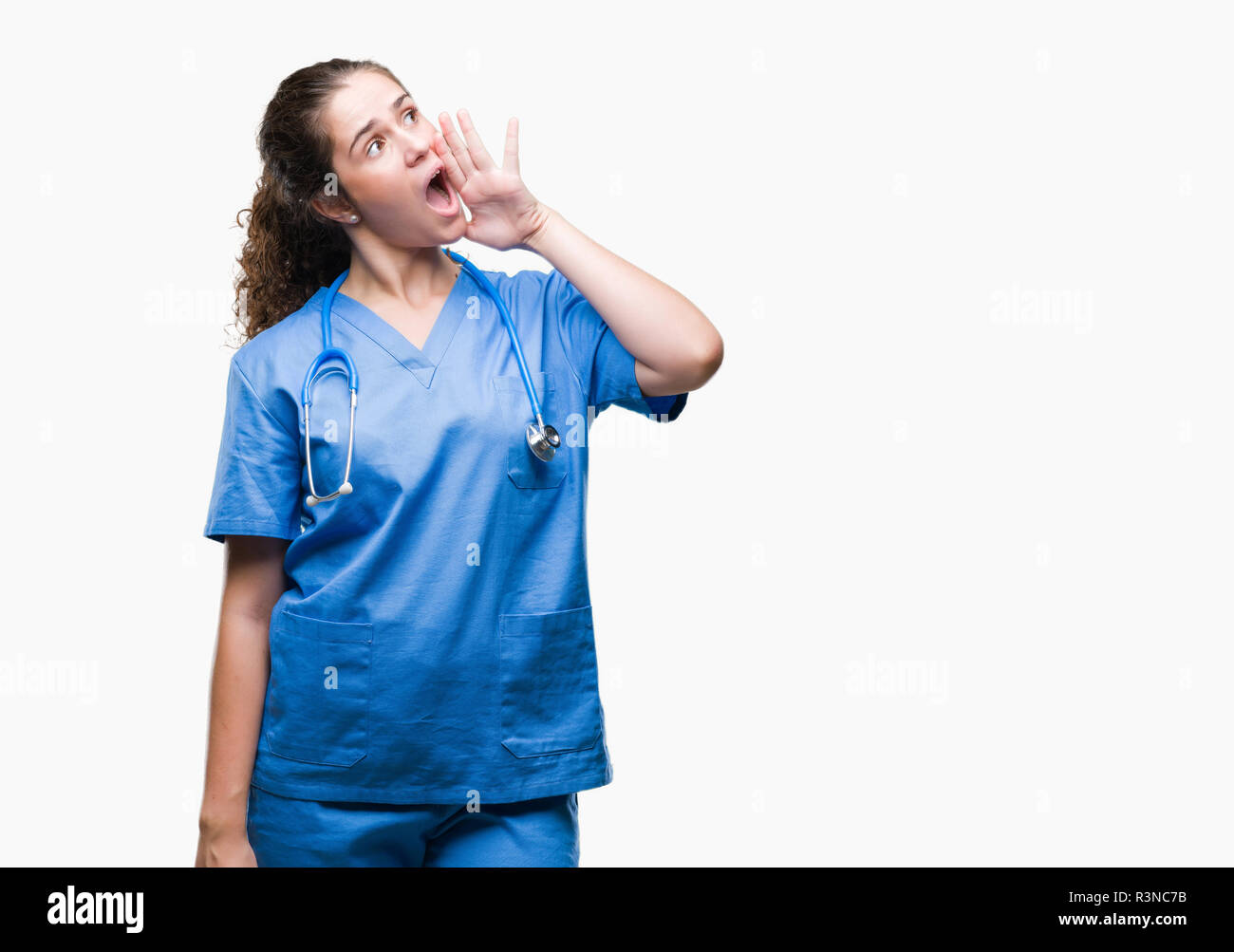 Young brunette doctor girl wearing nurse or surgeon uniform over ...