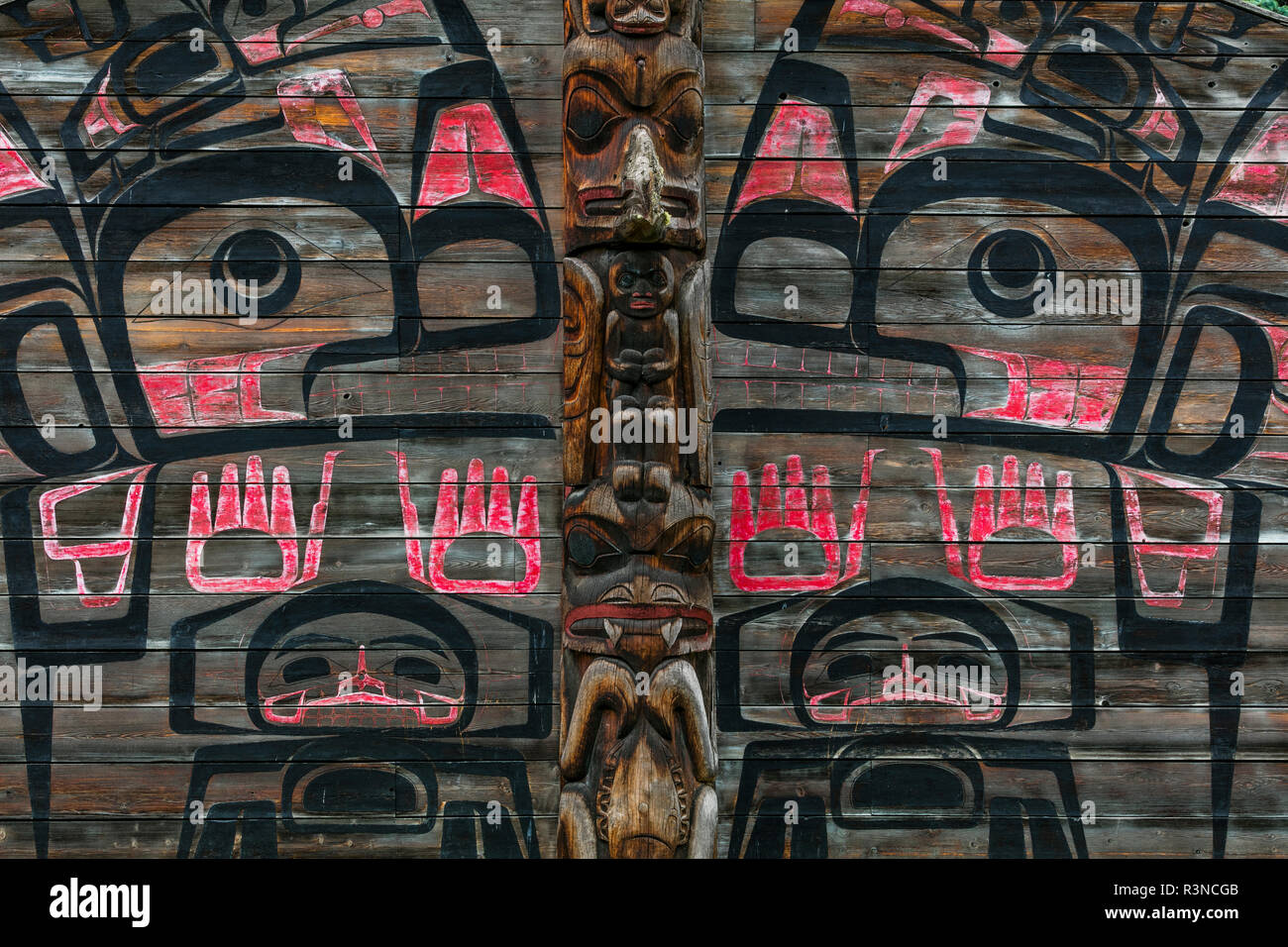 Canada, British Columbia, Hazelton. Totem poles and building at Ksan ...