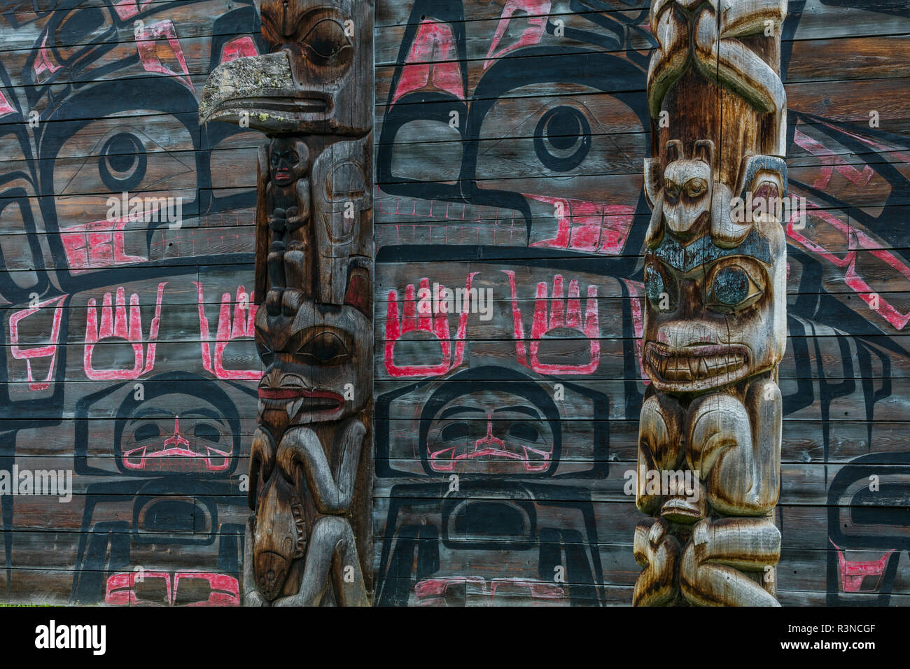 Canada, British Columbia, Hazelton. Totem poles and building at Ksan ...