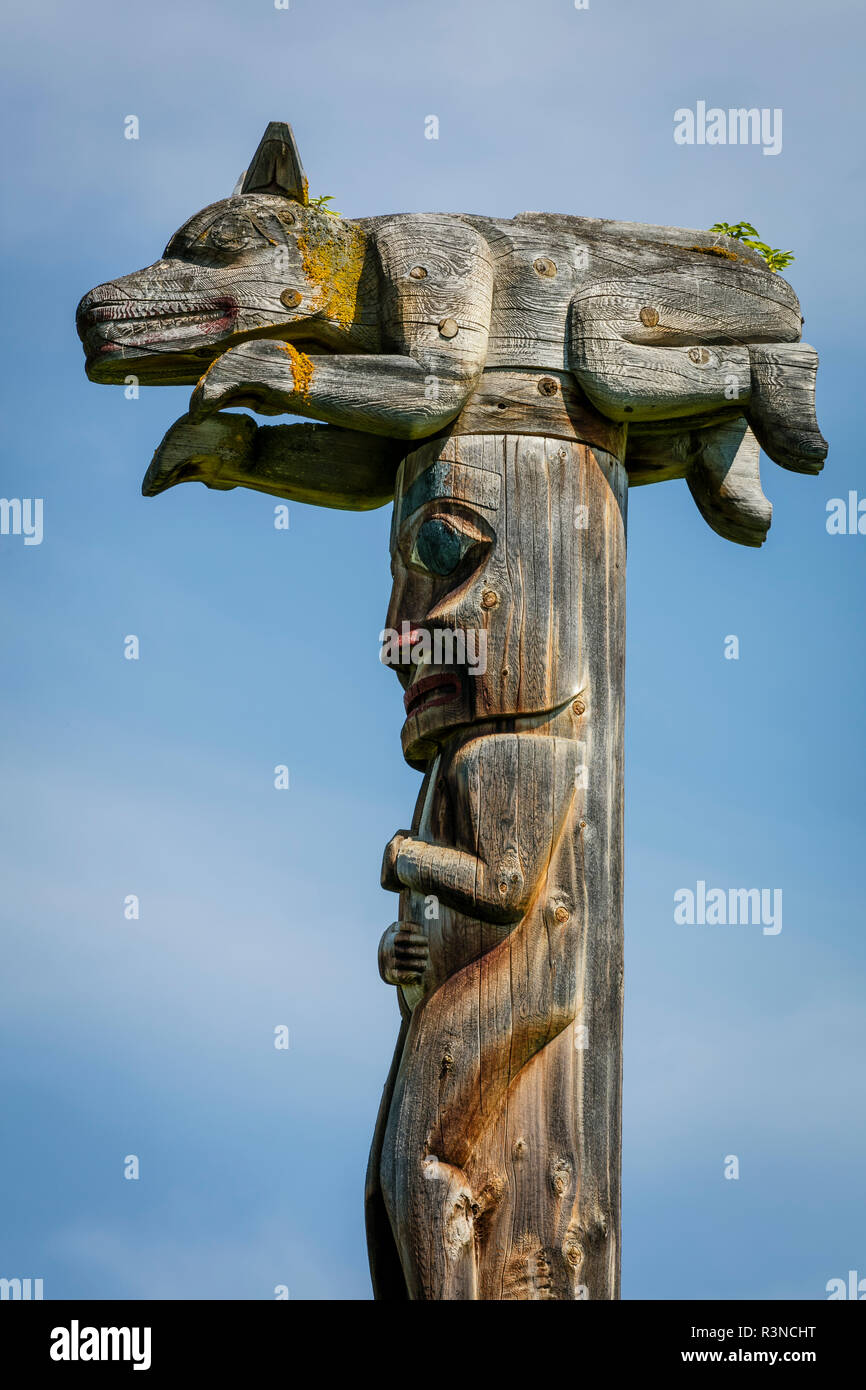 Canada, British Columbia, Gitanyow. Detail of Gitxsan tribe totem pole ...