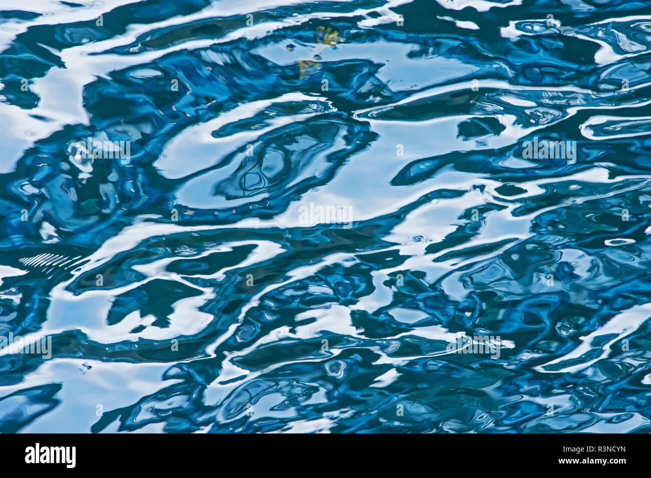 Canada, British Columbia, Prince Rupert. Water reflection patterns in ...