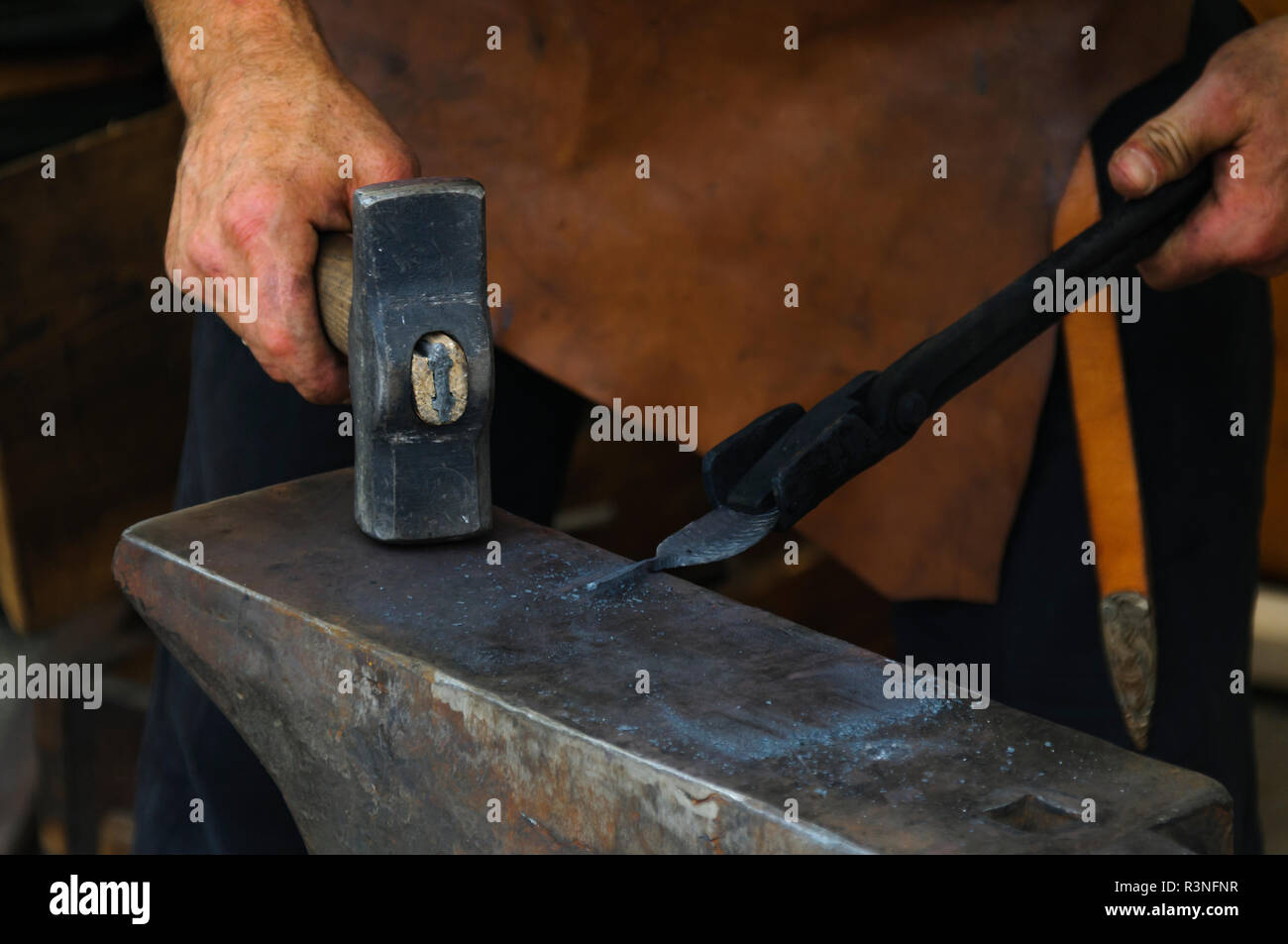 blacksmith at work Stock Photo - Alamy