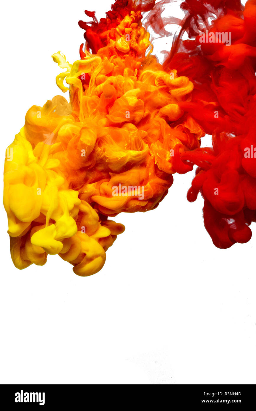 abstract formed by color dissolving in water over white background ...