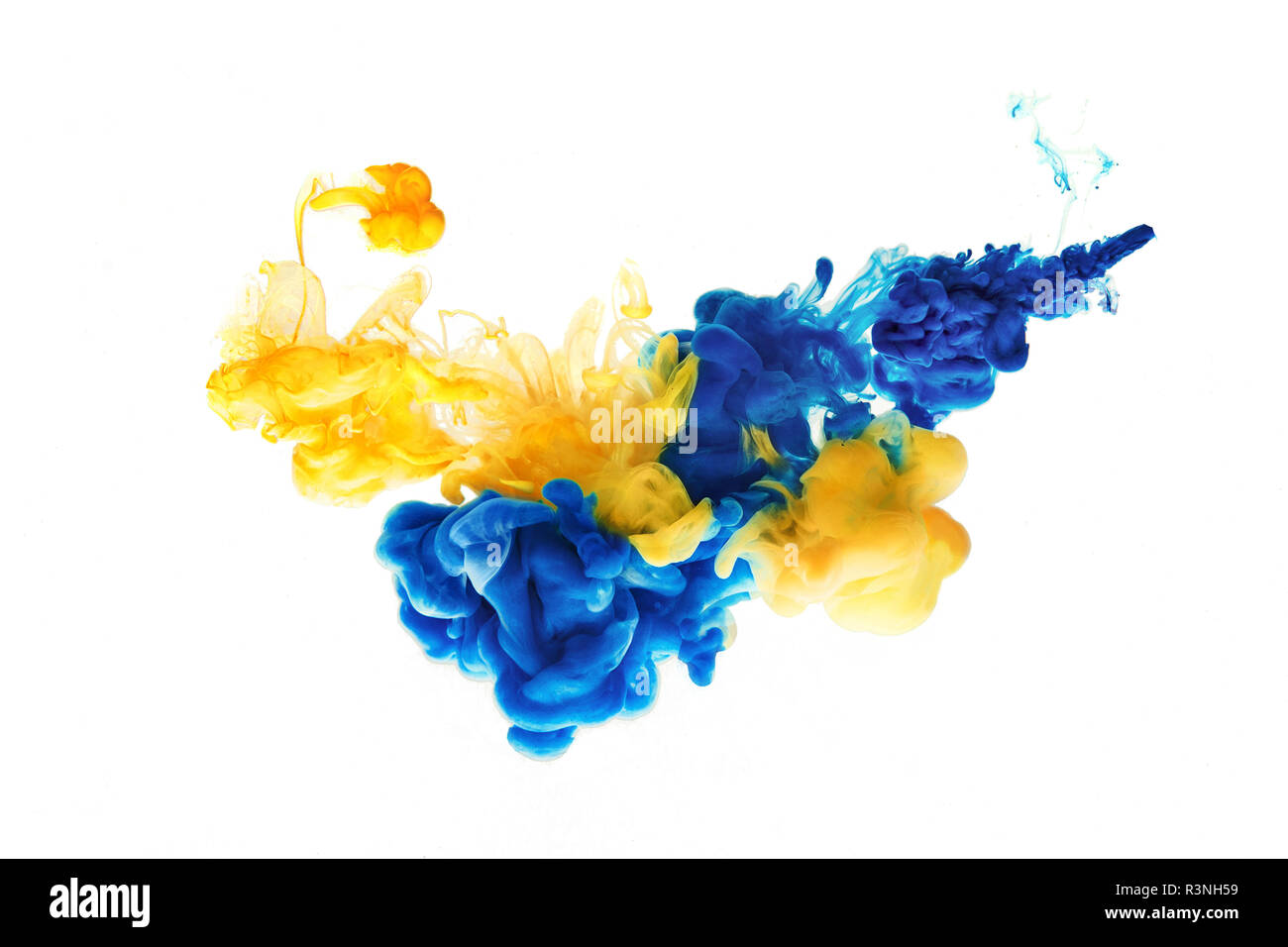 abstract formed by color dissolving in water over white background ...