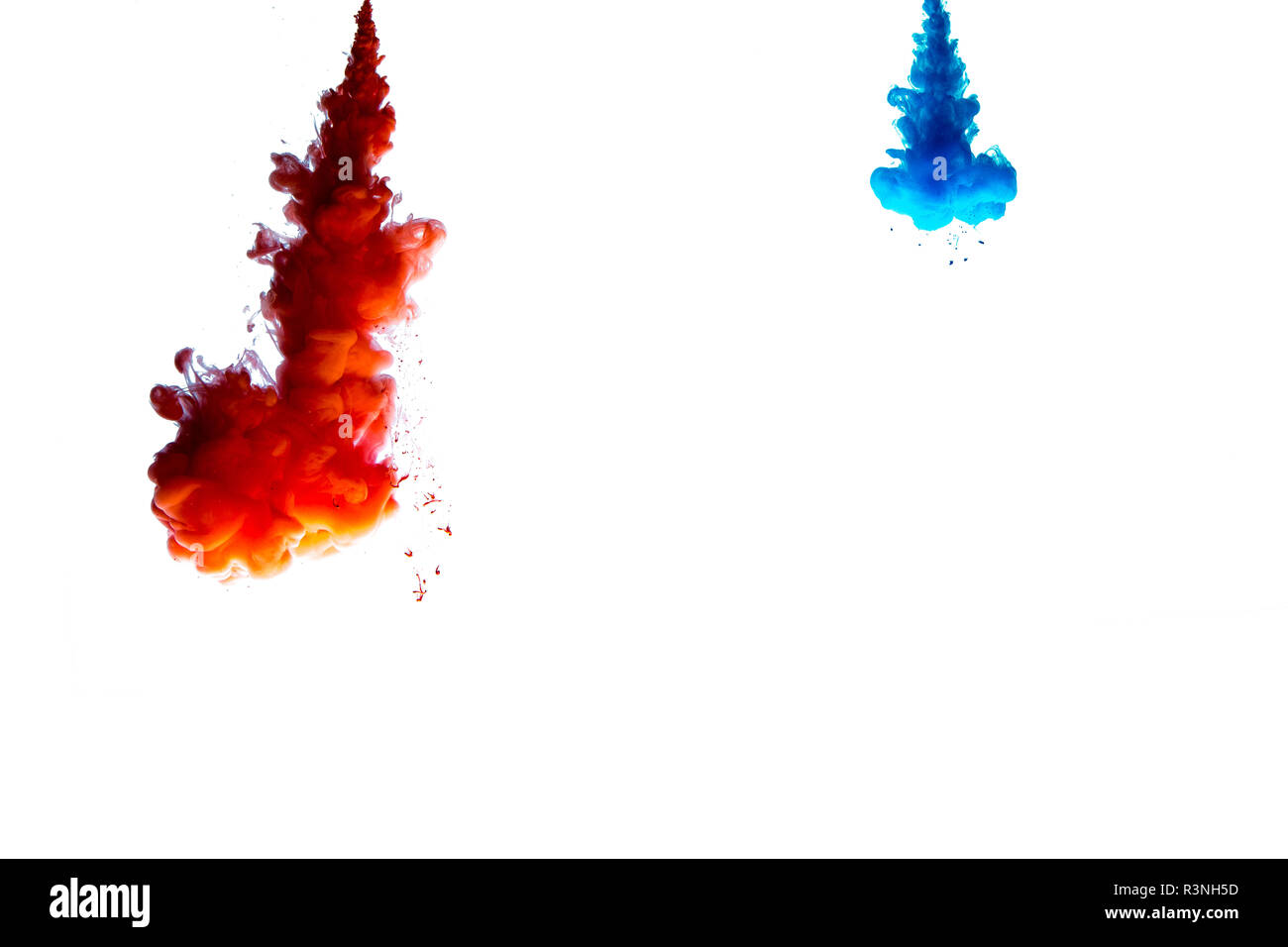 abstract formed by color dissolving in water over white background ...