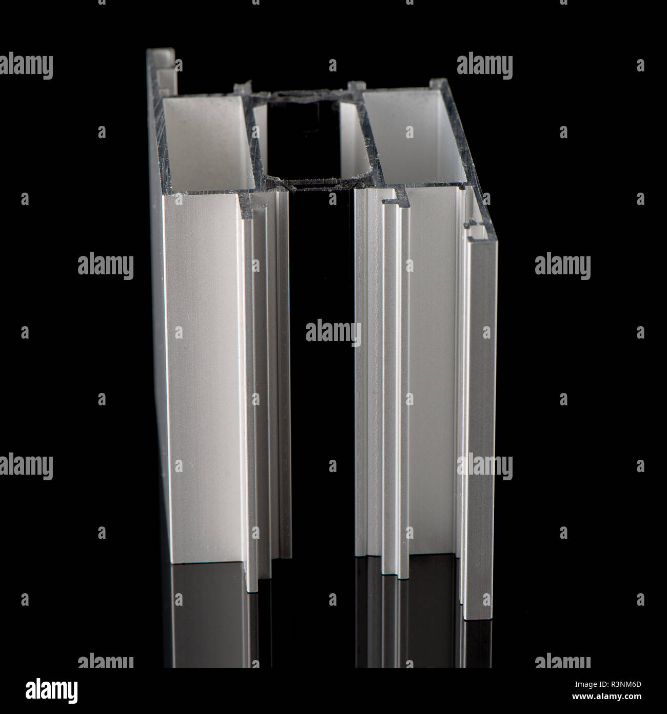 Aluminium profile sample isolated on black background Stock Photo - Alamy