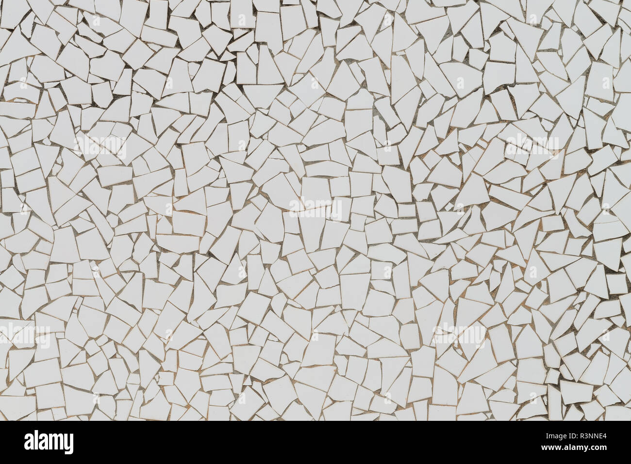 White broken tiles wall texture Stock Photo - Alamy