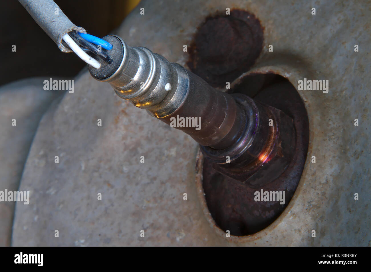 Heated oxygen sensor in the exhaust of a car with combustion engine ...