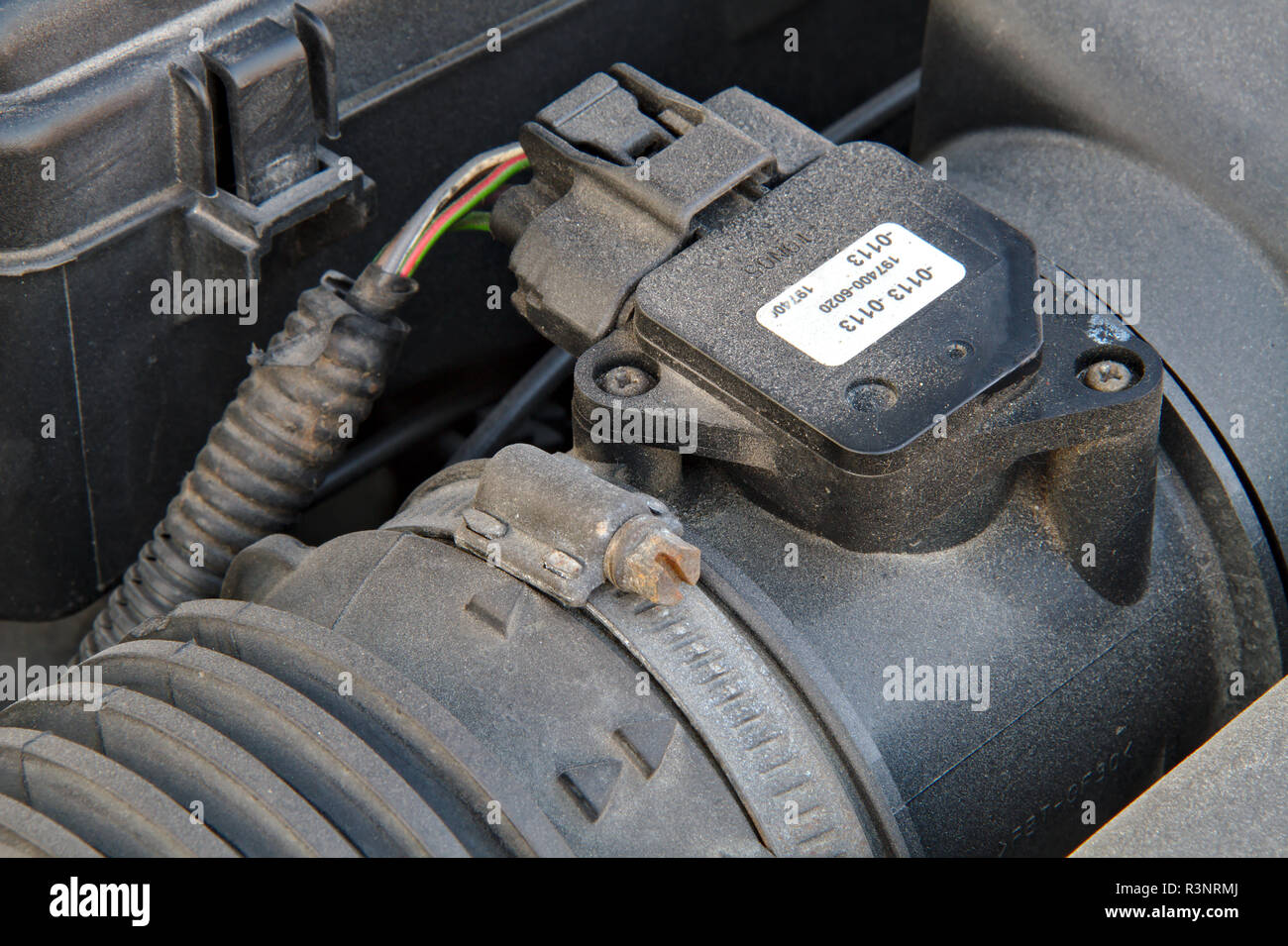 Mass air flow sensor of a car at the air filter housing Stock Photo - Alamy