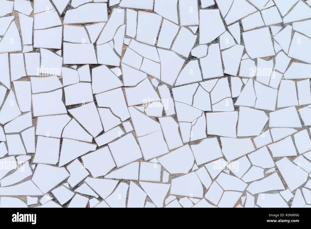 White broken tiles wall texture Stock Photo - Alamy