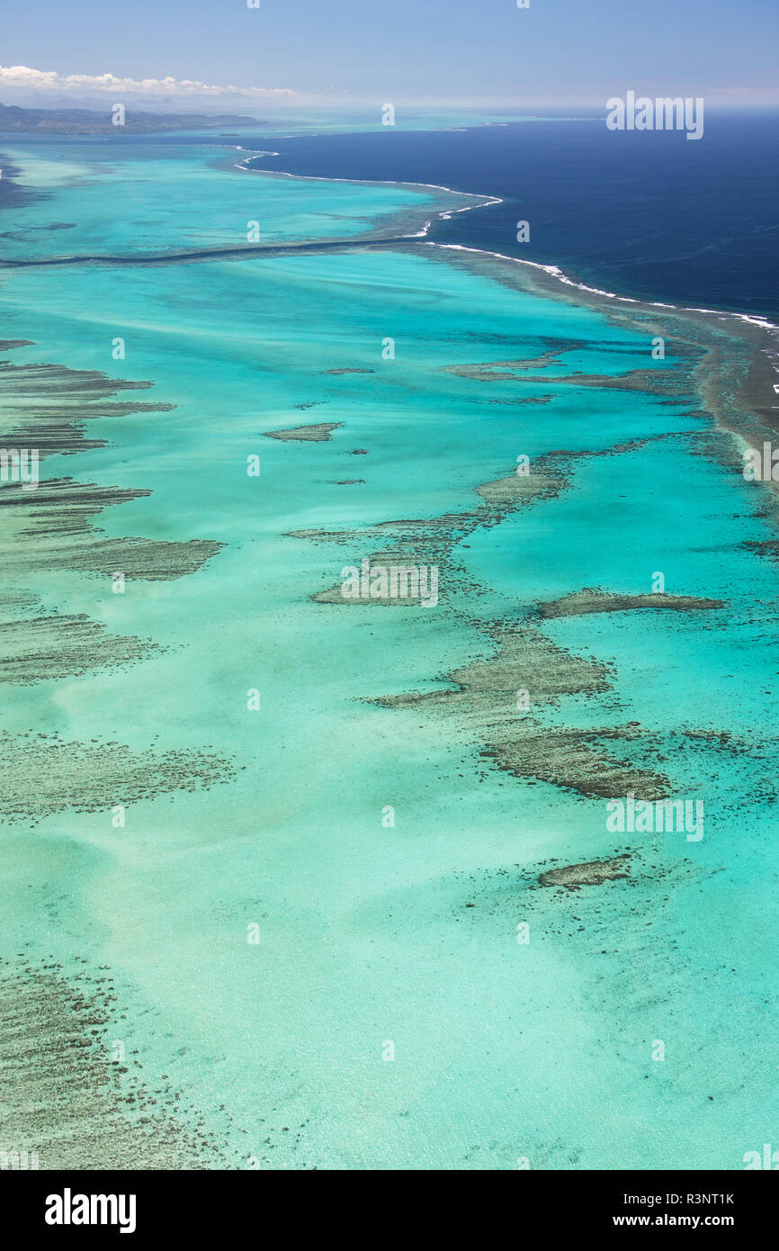 Aerial view on lagoon and reef of the west coast. Lagoon of Poe. West ...