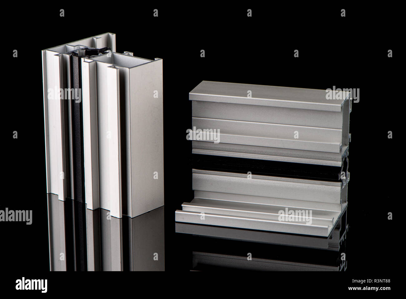Aluminium profile sample isolated on black background Stock Photo - Alamy