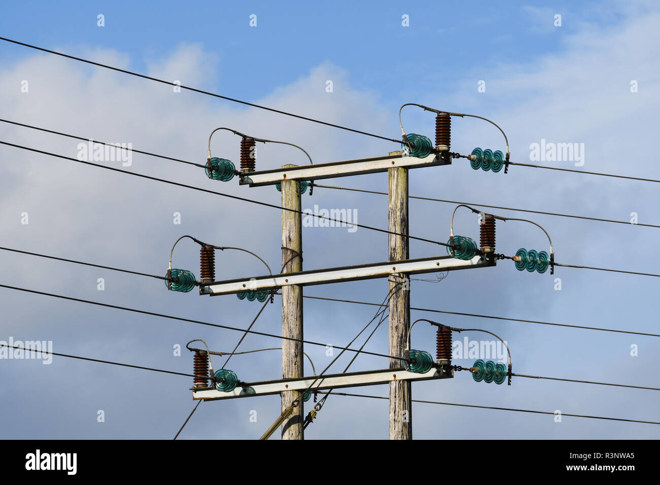 overhead wires on wooden poles Stock Photo - Alamy