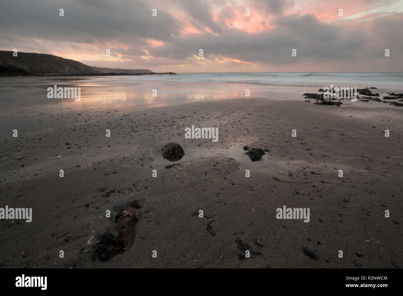 Sunrise over Kennack Sands Beach on the Lizard Coast of Cornwall Stock ...