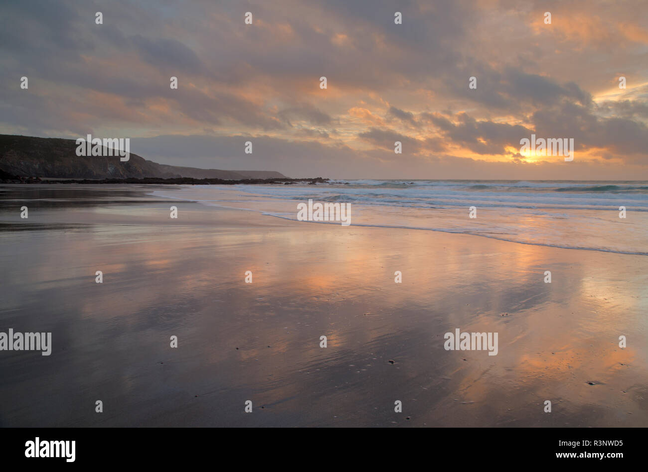 Reflections on the sandy beach of Kennack Sands on the Lizard Coast of ...