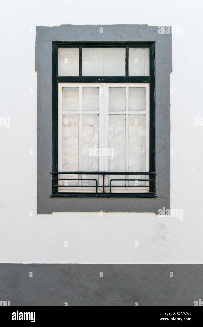 Traditional Portuguese window. With closed blinds Stock Photo - Alamy