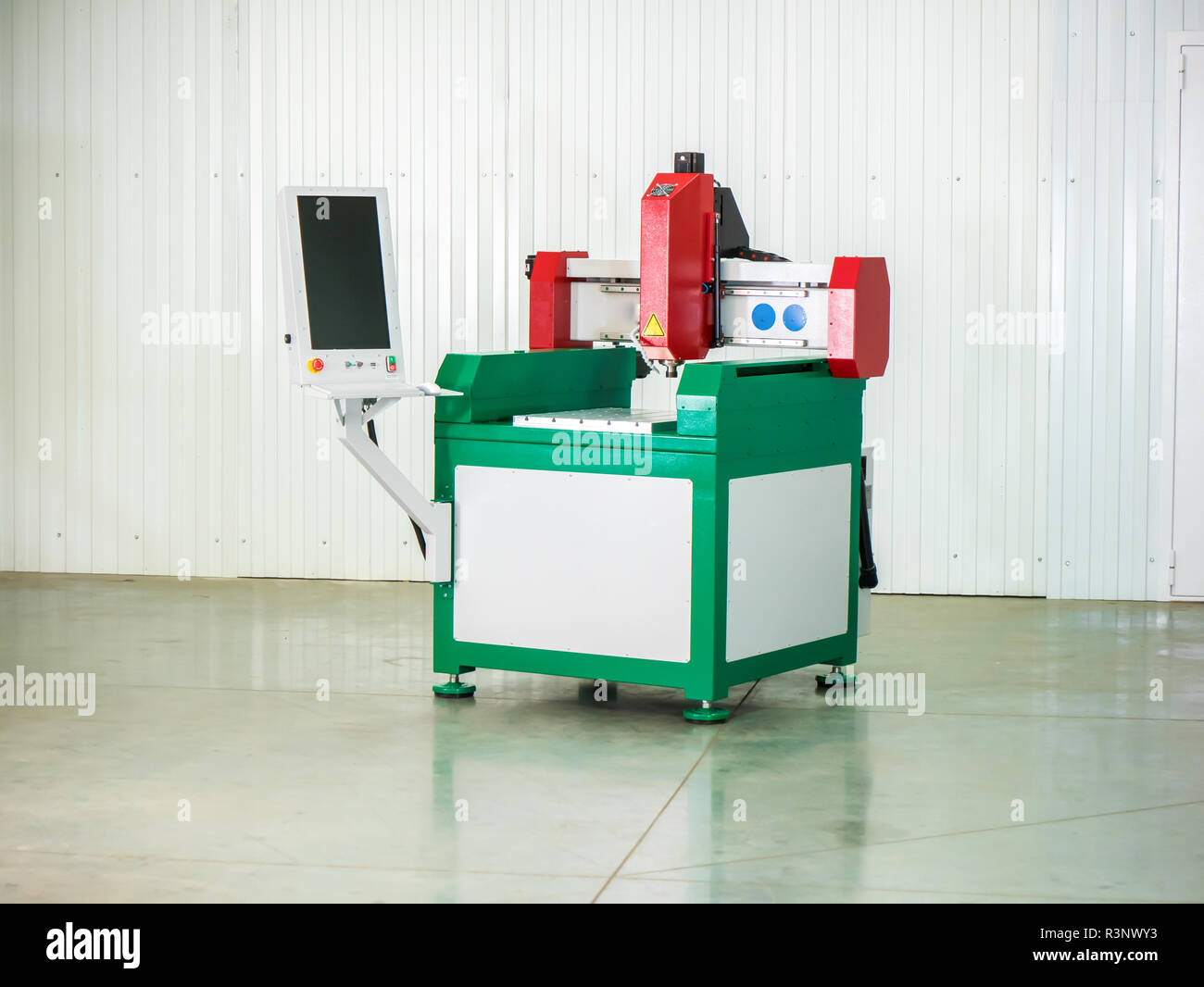 Industrial laser cutter. The programmed robot head Stock Photo - Alamy
