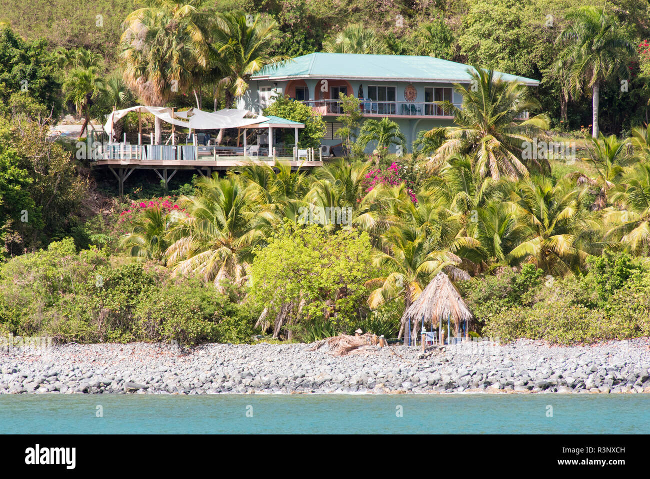 British Virgin Islands. Colorful waterfront beach house and shore hut ...