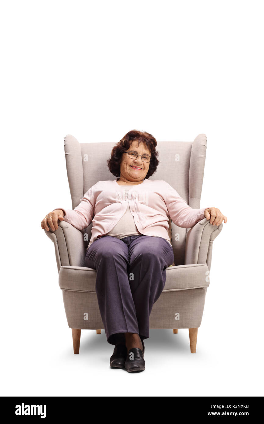 Elderly woman seated in comfy chair hi-res stock photography and images ...