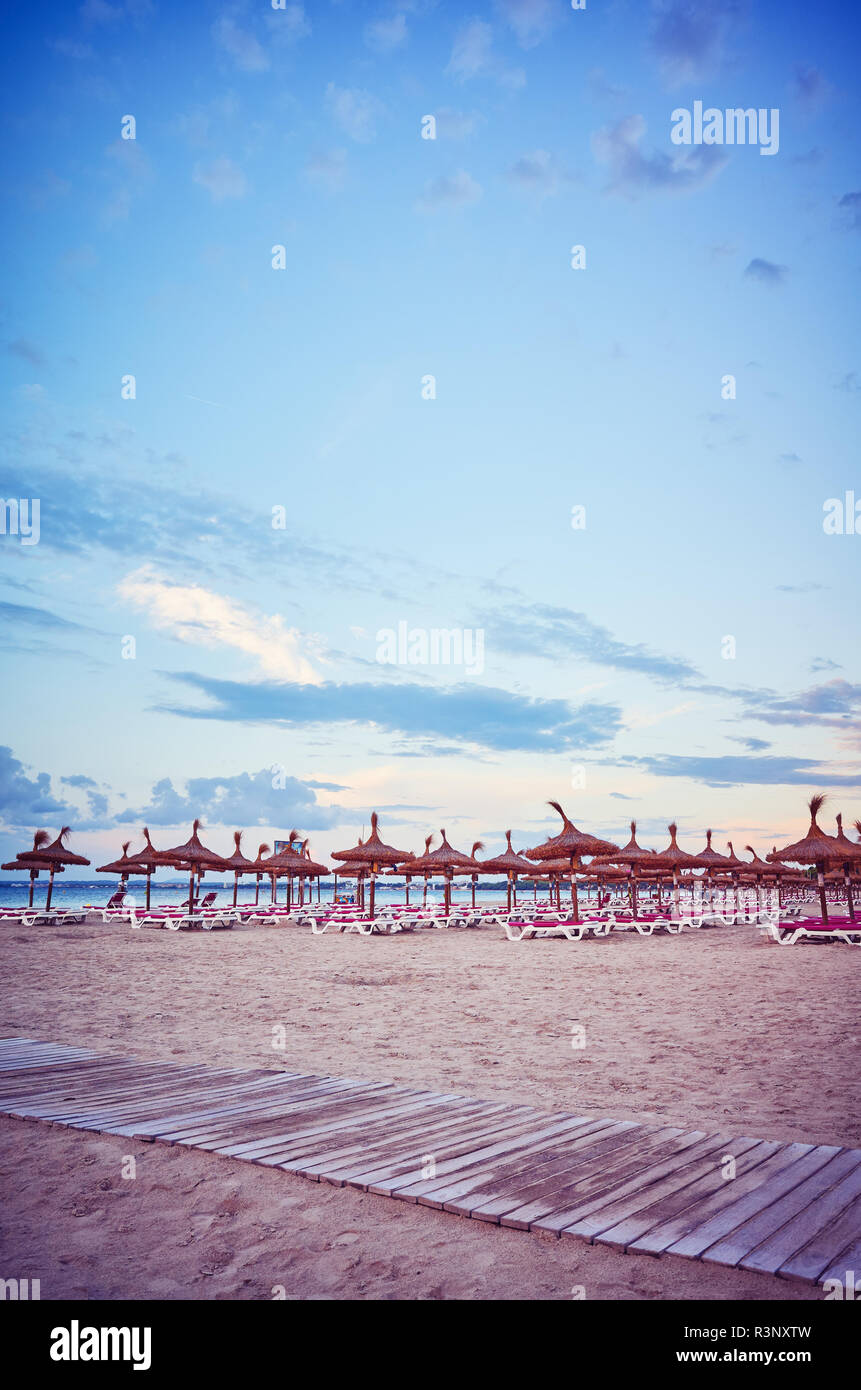 Empty beach at sunrise, color toned picture, Mallorca, Spain Stock ...
