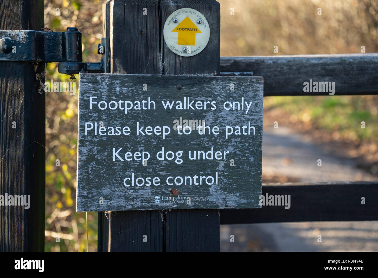 footpath sign on a gate 'walkers only, keep dogs under control' Stock ...