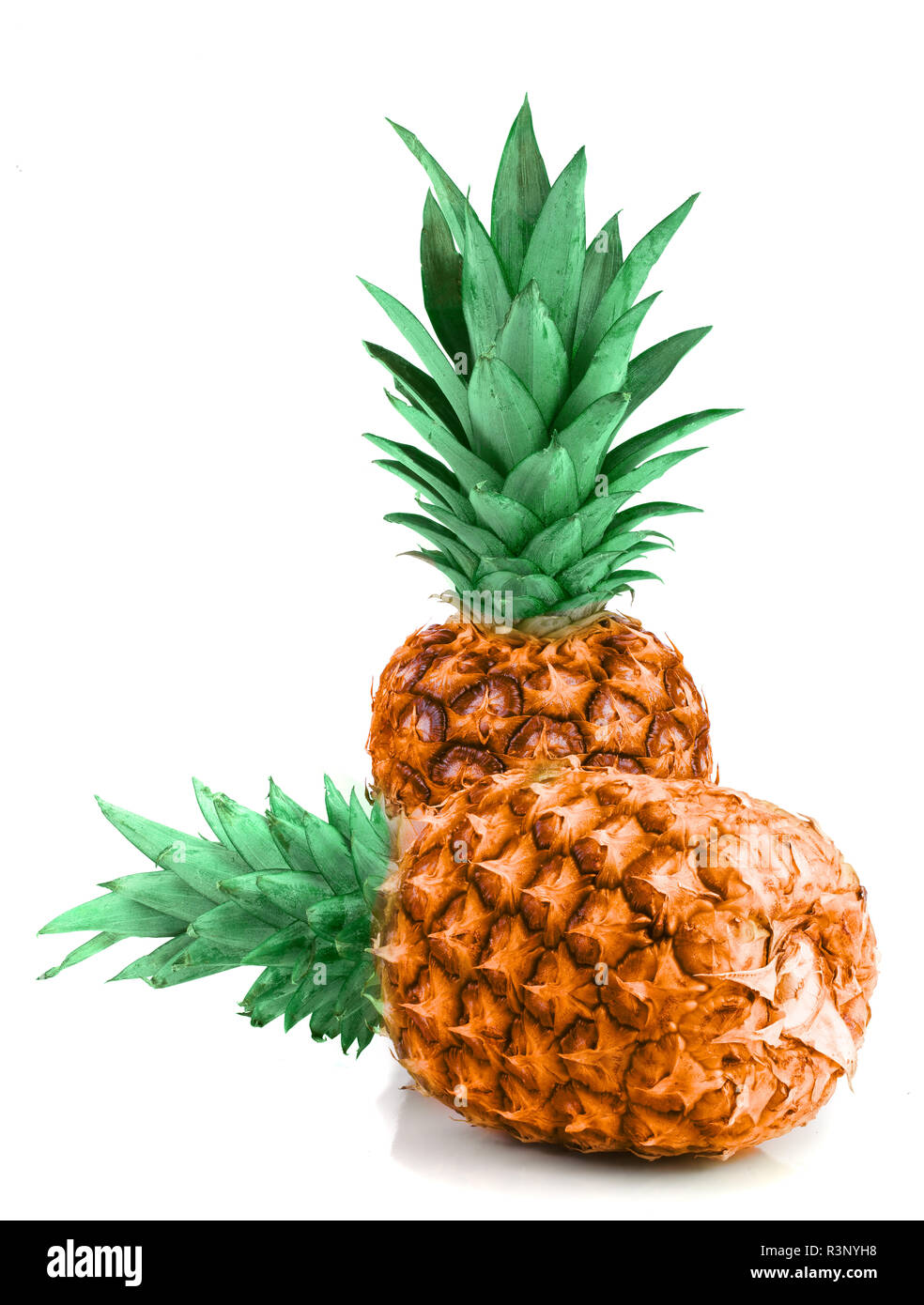 Two ripe pineapple isolated on white background Stock Photo - Alamy