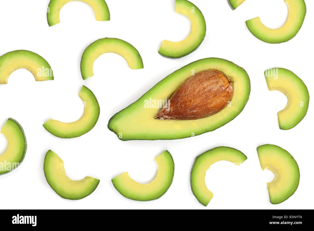 avocado slices isolated on white background. Top view. Flat lay pattern ...
