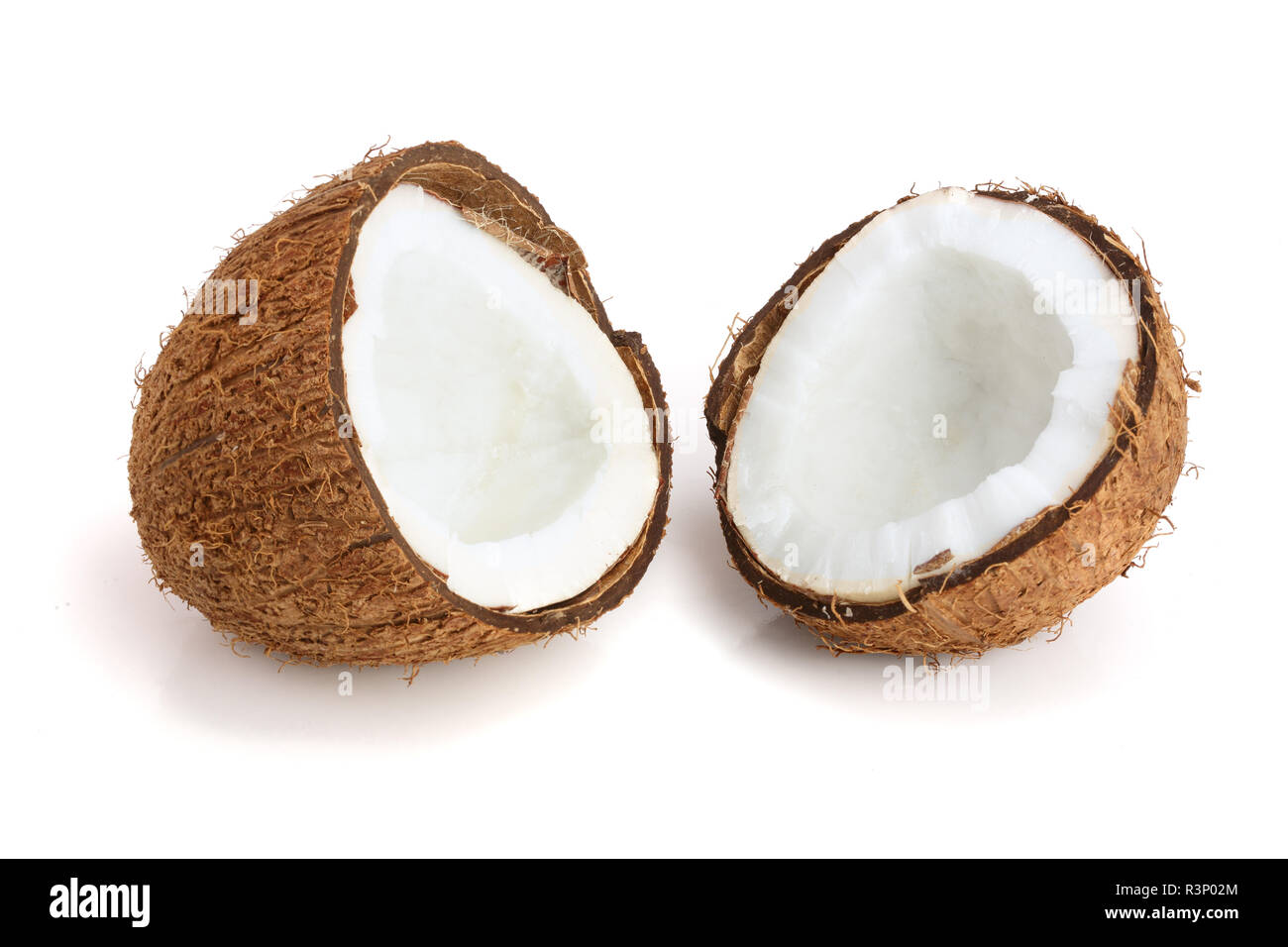 two coconut half isolated on white background Stock Photo - Alamy
